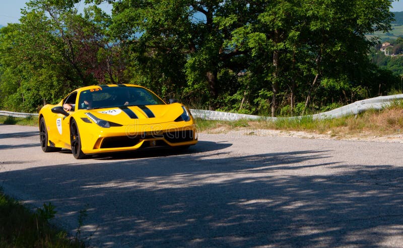 Yellow Ferrari 458 Speciale Driving in the Road Editorial Stock Image ...