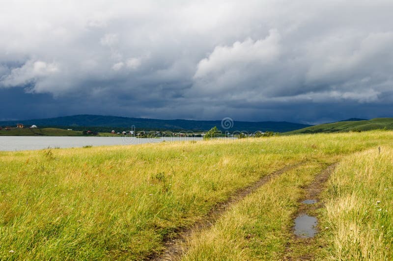 Yellow Field Near Lake after a Rain Stock Image - Image of business ...