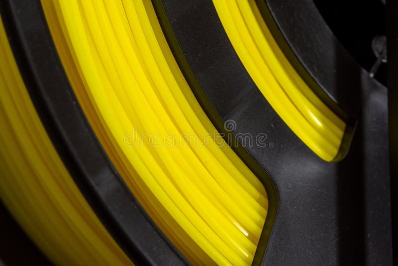 Yellow Filament of Plastic for Printing on 3D Printer. Spools of 3D ...