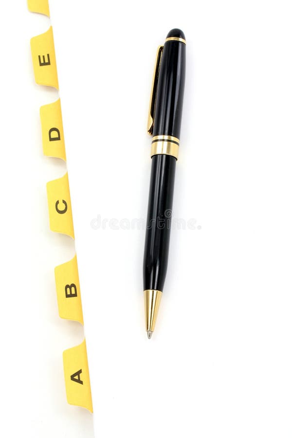 Yellow File Divider and Pen Stock Photo - Image of label, book: 1879292