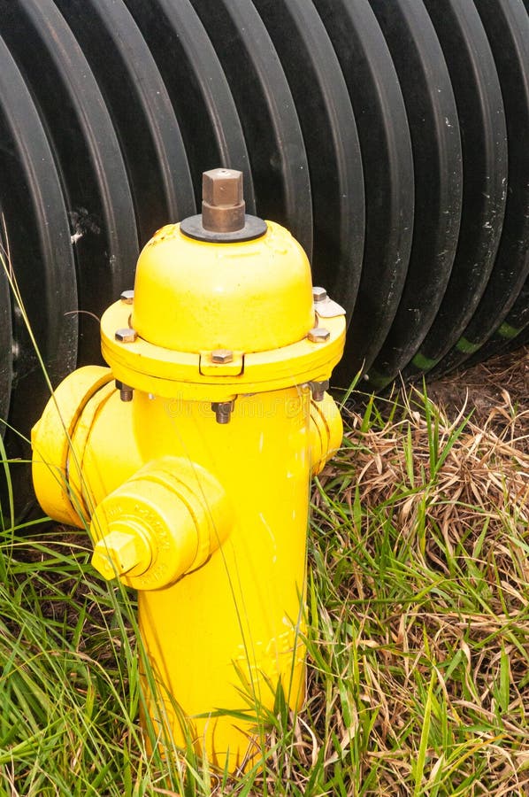 Yellow Fire Hydrant, at a Housing Construction Site Stock Photo - Image ...