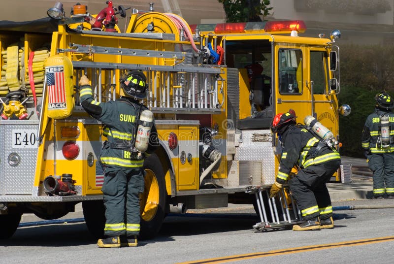 Yellow Fire Truck and Firefighters Stock Image - Image of burn ...