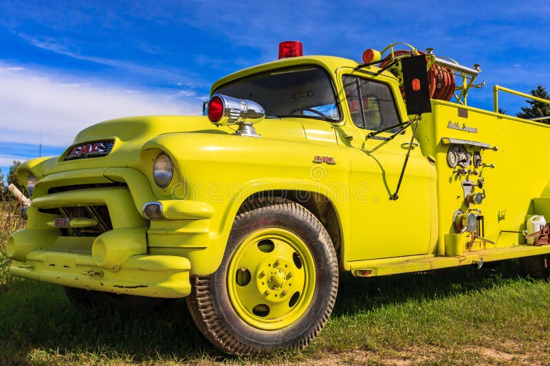 A Yellow Fire Truck with a Red Light on Top Editorial Photo - Image of ...