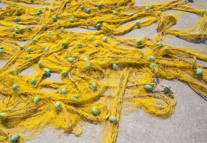 Yellow fishing net stock photo. Image of float, blue - 27018436