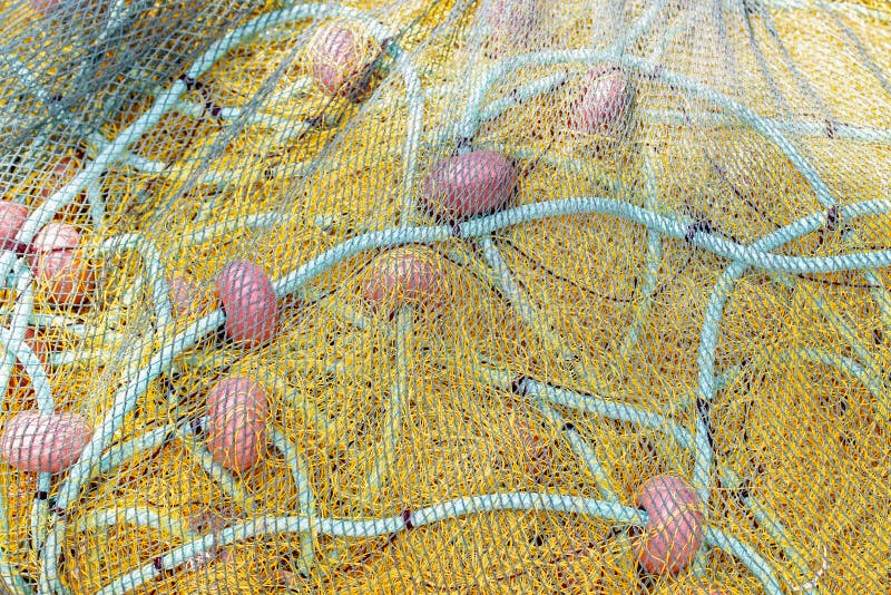 Yellow Fishing Net Drying on the Shore. Close Up View. Stock Photo ...