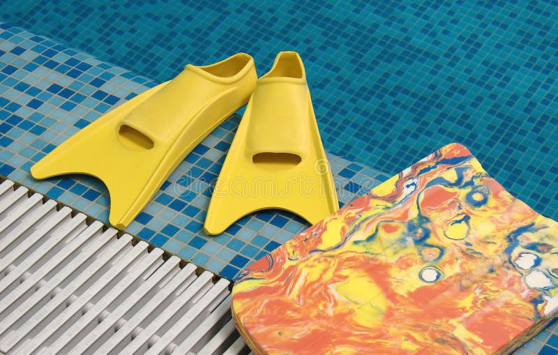 Yellow flippers with board stock image. Image of beach - 2962353