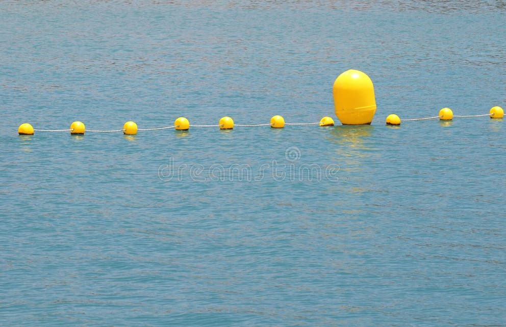 Yellow Floaters stock photo. Image of unlit, boat, bray - 32189524