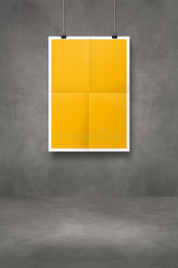 Yellow Folded Poster Hanging on a Dark Concrete Wall with Clips Stock ...