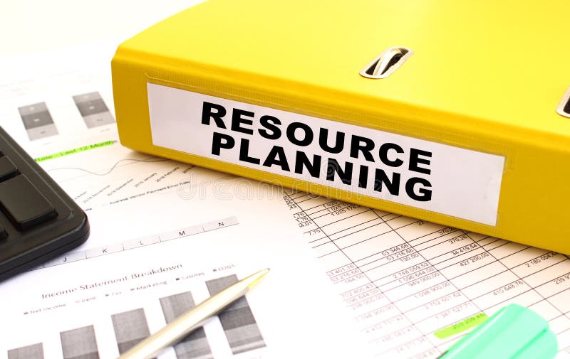 A Yellow Folder with Documents Labeled RESOURCE PLANNING Lies on the ...