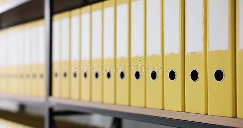 Yellow Folders Put in Long Line on Shelf of Rack in Office Stock Video ...