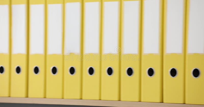 Yellow Folders with Tax Documents in Rows on Shelves Stock Video ...