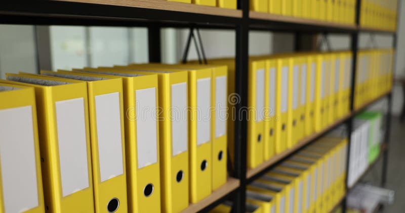 Yellow Folders with Files Standing on Shelves in Archive Stock Video ...