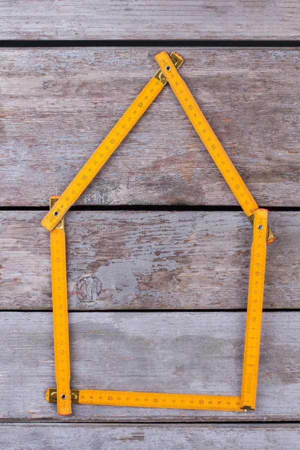 Yellow Folding Ruler in a Shape of House. Stock Image - Image of metric ...