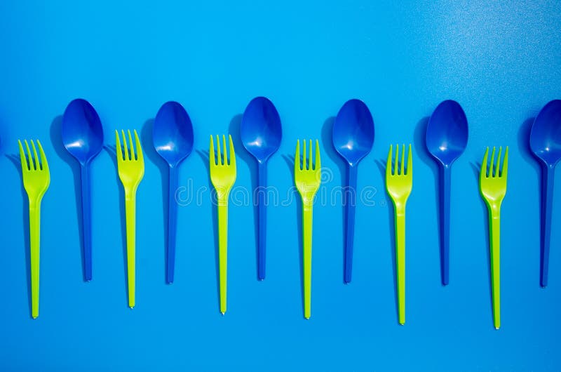 Pattern of Blue Plastic Spoons on Blue Background. Blue Color of 2020 ...