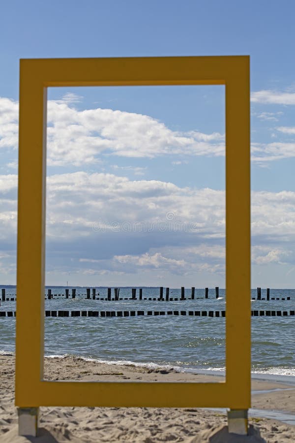 Yellow Frame in the Sand of a Beach Stock Image - Image of yellow ...