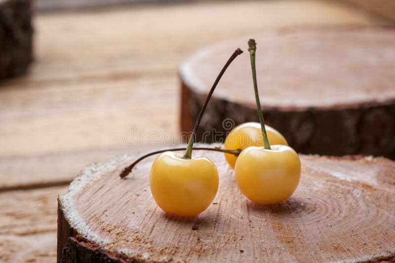 Yellow Fresh Cherry on a Rustic Wooden Table. Stock Image - Image of ...
