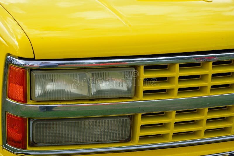 Yellow Front of car stock photo. Image of headlamp, detail - 33574106