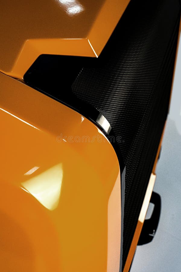 Yellow Front Panel of a Car Tractor. Industry Technologies, Metal Mesh ...