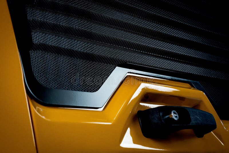 Yellow Front Panel of a Car Tractor. Industry Technologies, Metal Mesh ...