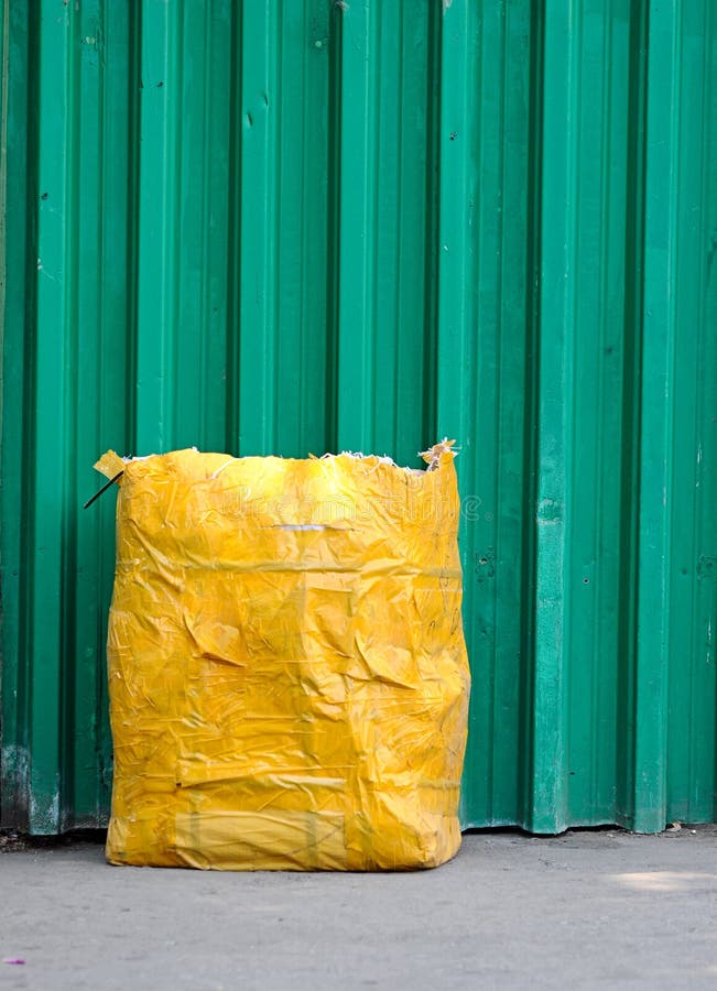 Yellow garbage bag stock image. Image of road, heap, yellow - 25681759