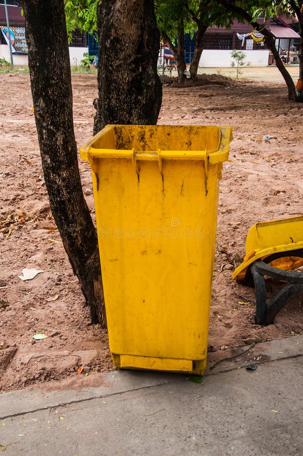 Yellow garbage bins stock photo. Image of street, rubbish - 48118526