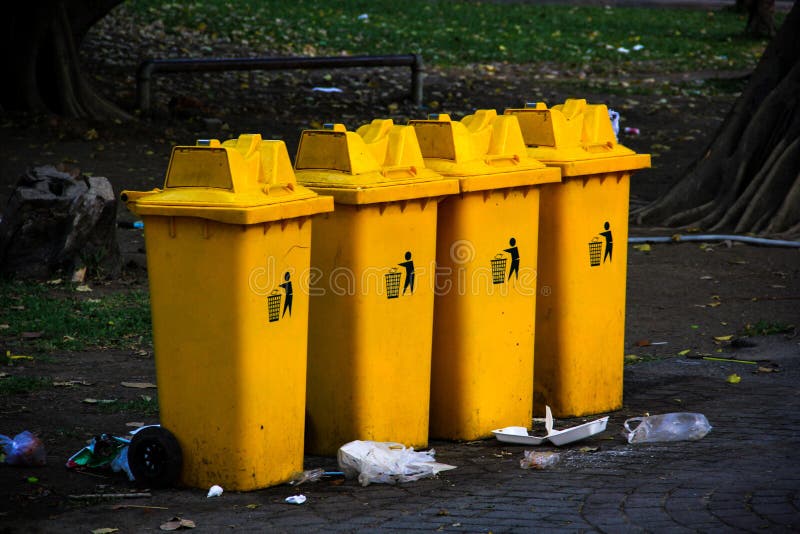 Yellow garbage bins stock image. Image of junk, trash - 73957801