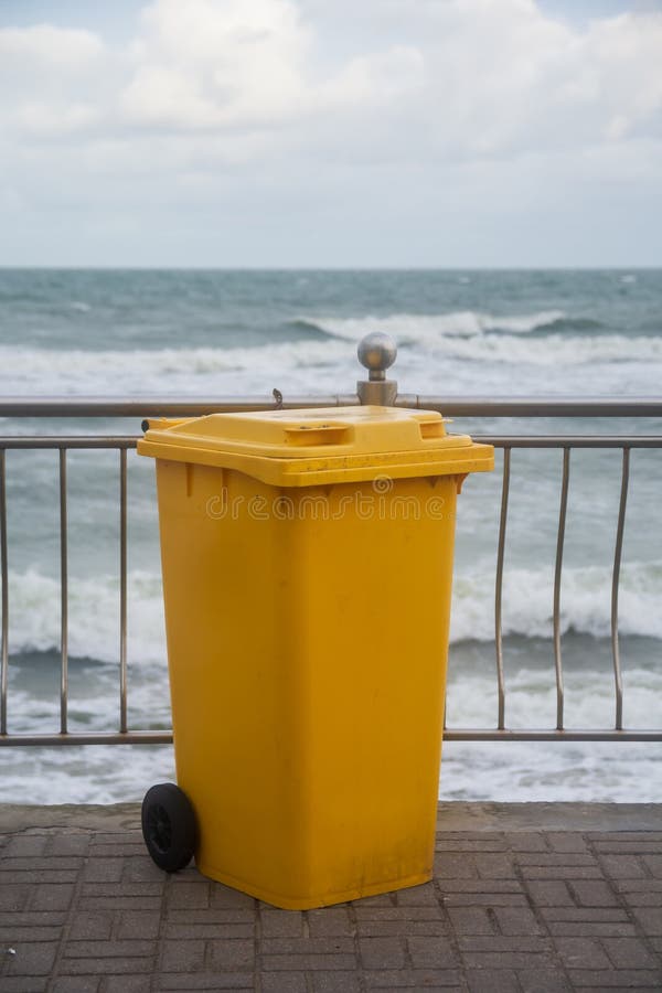 Yellow garbage bins stock image. Image of cleaning, discard - 33179099