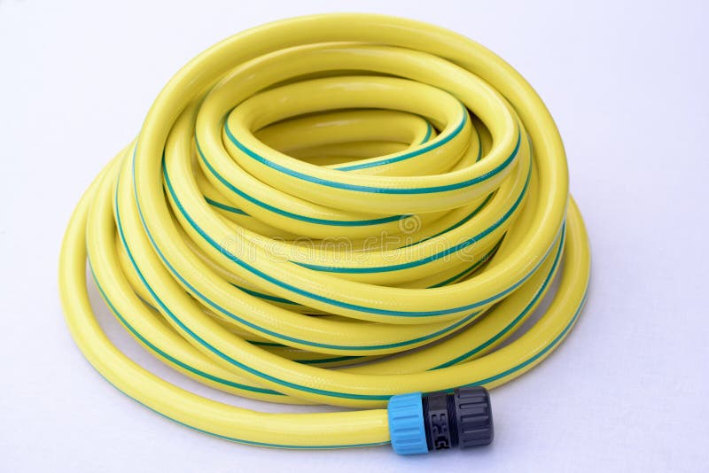 Yellow garden hose-pipe stock image. Image of gardening - 95192907