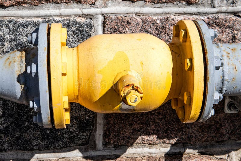 Yellow Gas Pipe on the Wall of the Building Stock Photo - Image of line ...