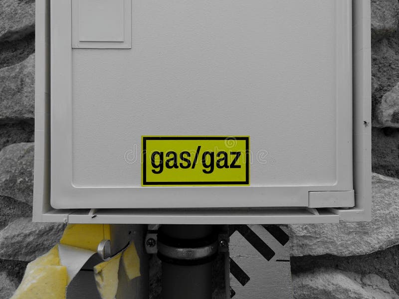 Yellow Gas Sign on White Box of House Stock Photo - Image of fitting ...