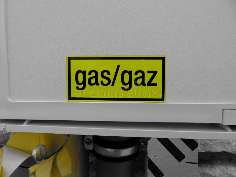 Yellow Gas Sign on White Box of House Stock Photo - Image of danger ...