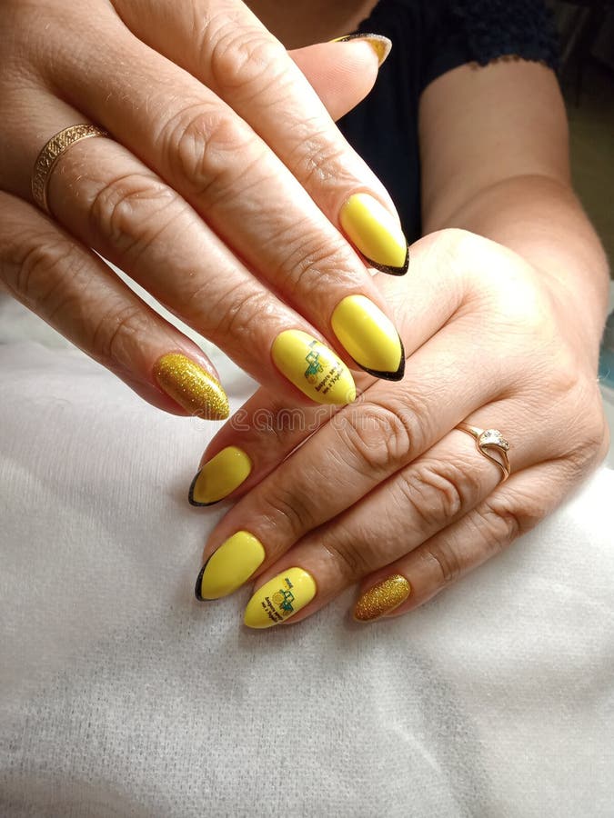 Yellow gel nail polish stock photo. Image of yellow - 260078574