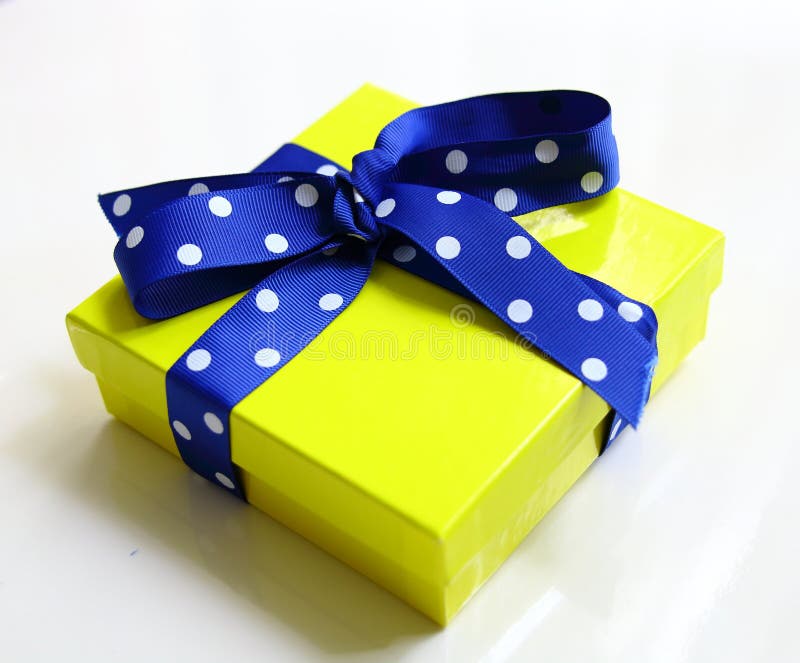 Yellow Gift Box and Blue Dotted Ribbon Isolated Stock Image - Image of ...