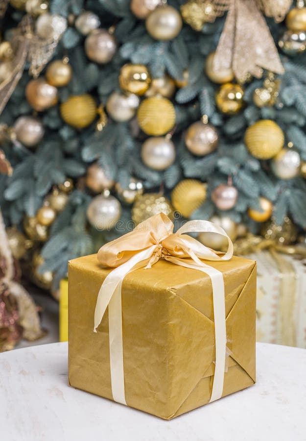 A Yellow Gift Box with Black Ribbon Puts on Black and Yellow Background ...