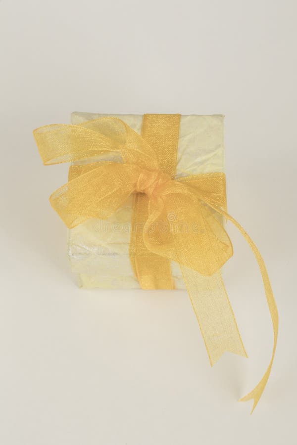 Yellow gift box stock image. Image of anniversary, birthday - 83250445