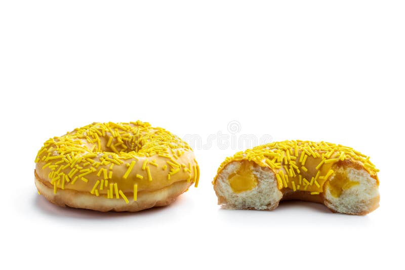 Yellow Glazed Doughnuts in Gray Tray Isolated on White Stock Photo ...
