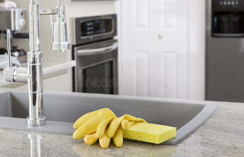 Yellow Gloves and Sponge in Kitchen Stock Photo - Image of kitchen ...