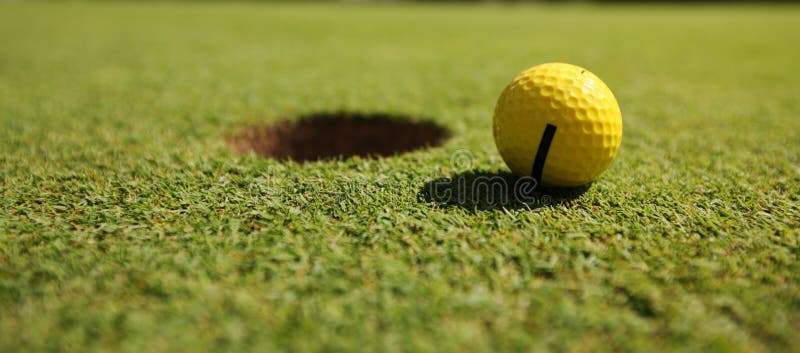 Yellow golf-ball stock image. Image of competition, hole - 11055151