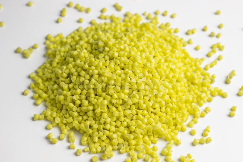 Yellow Granules of Polypropylene or Polyamide on a White Background ...