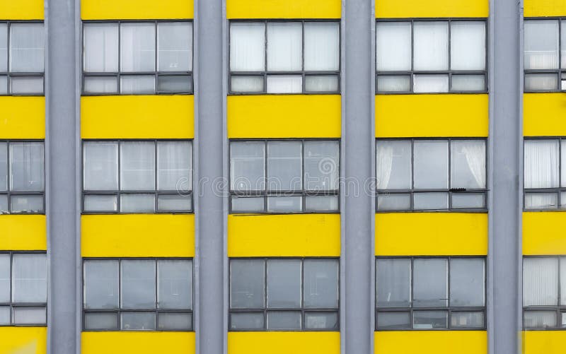 Yellow and Gray Building Background with Windows. Architecture Exterior ...