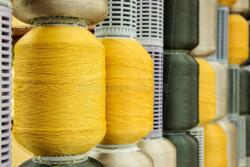 Yellow and Gray Silk Thread in Spool Stock Photo - Image of silk ...