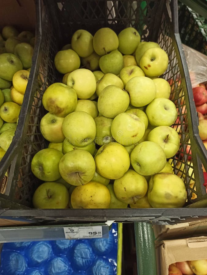Yellow apples in the box stock image. Image of strawberry - 206607439