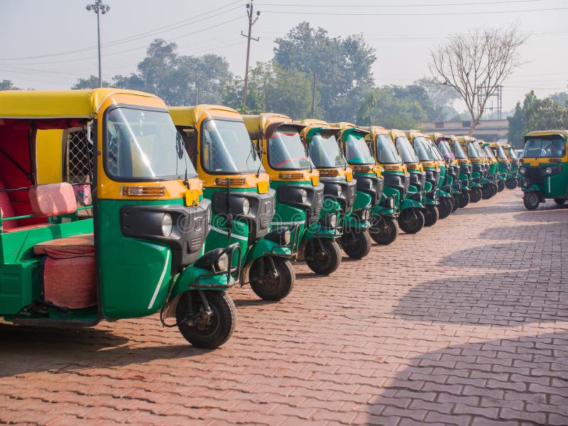 Yellow and Green Auto Rickshaws in Indiya. Stock Photo - Image of ...