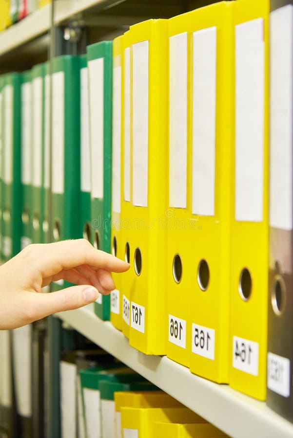 Yellow and Green File Folders in Archive and Human Hand Stock Image ... Yellow and Green File Folders in Archive and Human Hand Stock Image ...