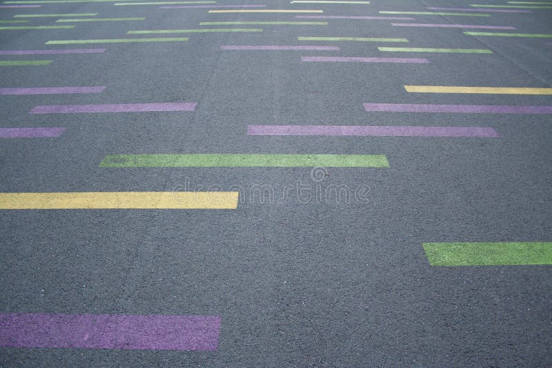 Yellow, Green and Purple Lines Painted on the Asphalt Ground Stock ...