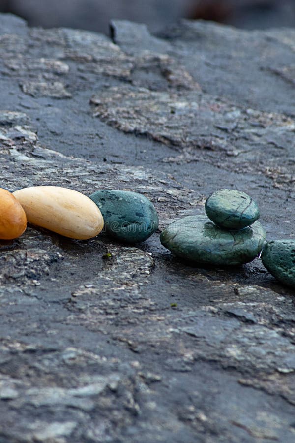 Yellow and Green Rocks on Stone Slab Stock Image - Image of blue ...