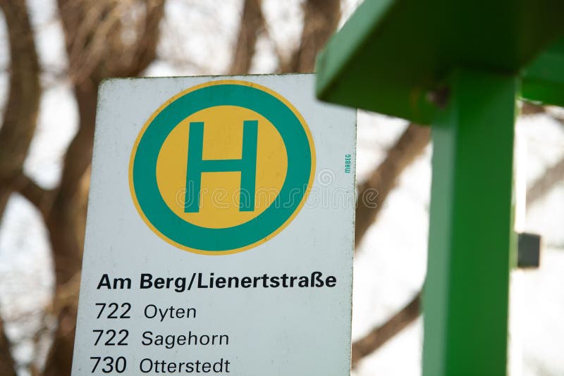 Yellow Green Sign in the Bus Stop Editorial Stock Photo - Illustration ...