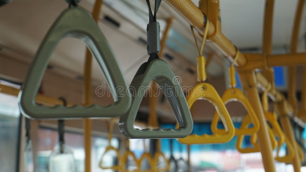 Yellow and Grey Handrail Ring for Standing Passenger Inside a Bus Stock ...
