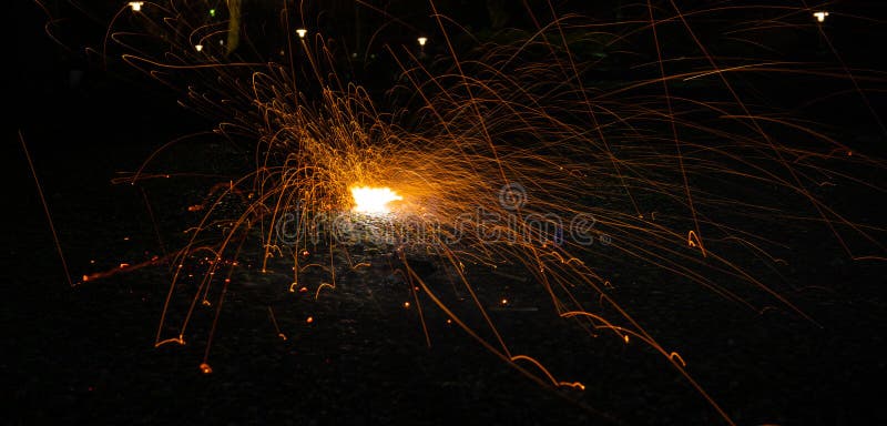 Yellow Ground Fireworks on Asphalt.. Stock Image - Image of dark ...