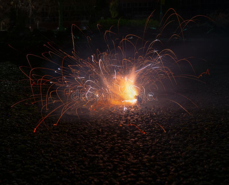 Yellow Ground Fireworks on Asphalt.. Stock Photo - Image of long ...